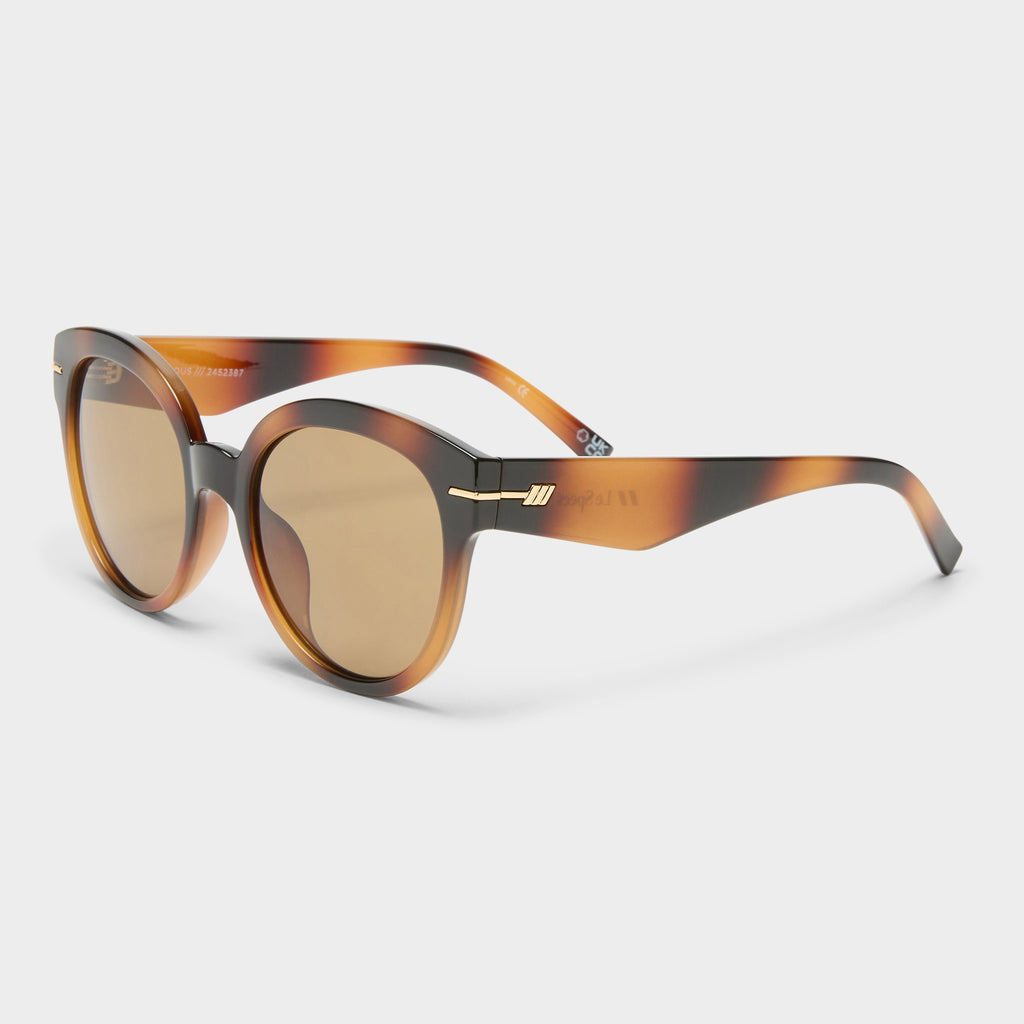 Capacious Tort Female Round Sunglasses | Le Specs