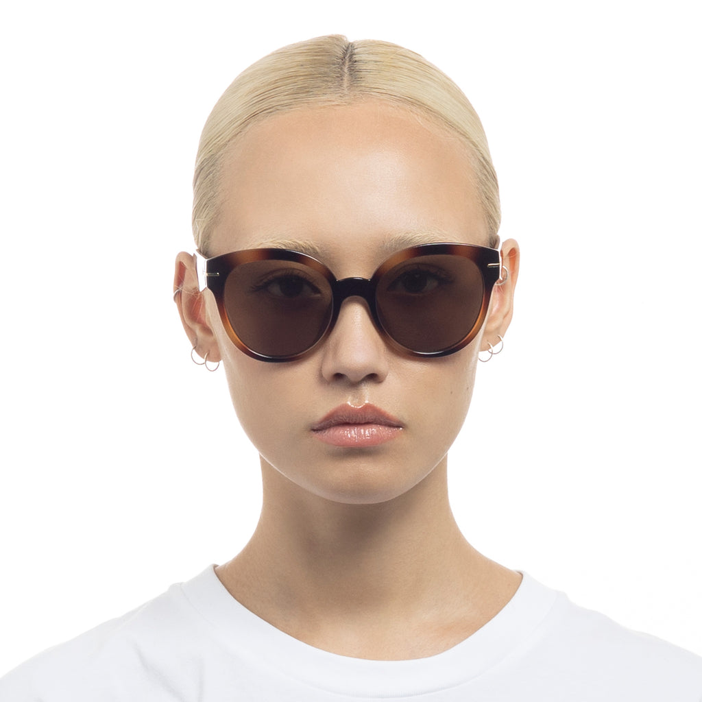 Capacious Tort Female Round Sunglasses | Le Specs