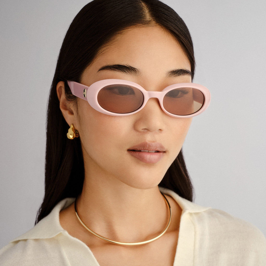 Work It! Pink Putty Female Oval Sunglasses | Le Specs