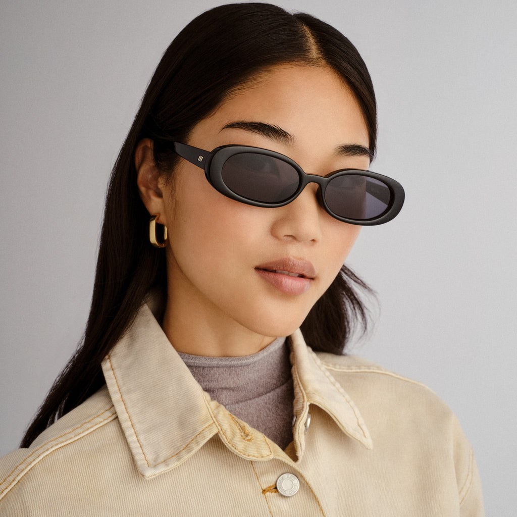 Outta Love Wide Fit Black Uni-Sex Oval Sunglasses | Le Specs